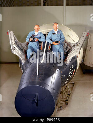 American Astronauts James A. Lovell Jr. (center), commander, and ...