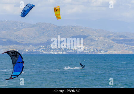 MALAGA, SPAIN - MAY 25, 2018 People practicing active sport, wave ...