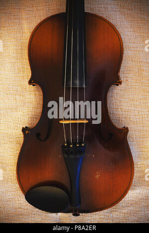 Details of an old and dusty violin from Czechoslovakia and tambourine ...