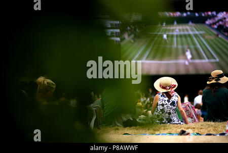Spectators watch the big screen on Murray Mound on day two of the ...