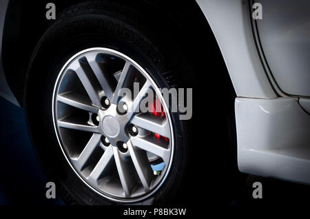 Luxury alloy wheel in close-up as an automotive Stock Photo - Alamy