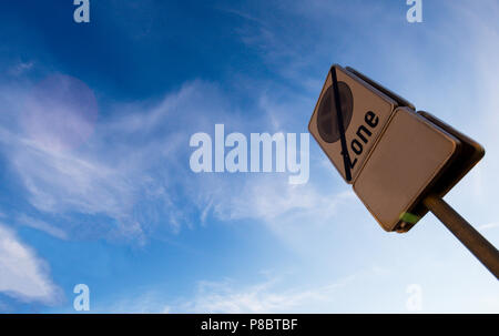 Round road sign with a red cross on a blue background. A sign means a ...