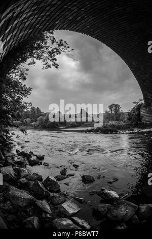 Under the arches of John Rennie the Elder's bridge in Kelso, Scotland ...