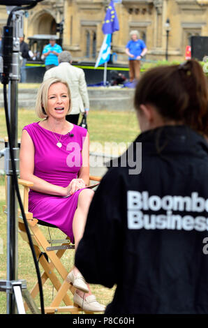 Caroline Hyde, business anchor for Bloomberg Business TV, broadcasting ...