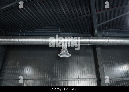 Ventilation system on the ceiling of large buildings. Ventilation pipes ...