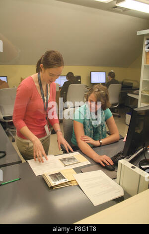 80th Anniversary Celebration . Sarah Malcolm and Bill Baehr work on ...