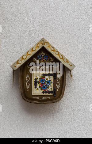 In a wooden box decorative home greens. In the kitchen on the ...