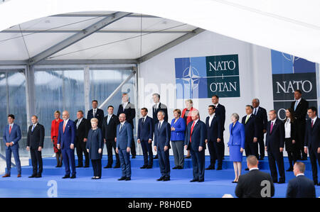 NATO heads of state and government pose for a group photo prior to a ...