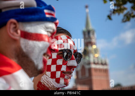 English and Croatian football fan cheer on the Red Square in Moscow ...