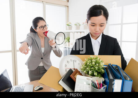 Chinese woman helpless gesture Stock Photo - Alamy