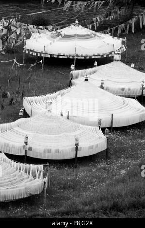 Prayer flags in the shape of auspicious umbrellas bless the world in ...