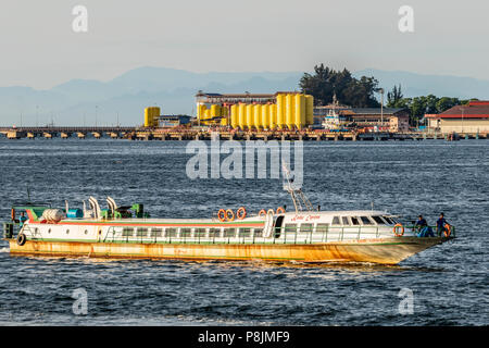 Fast ferries in Labuan harbour they bring people to and from the duty ...