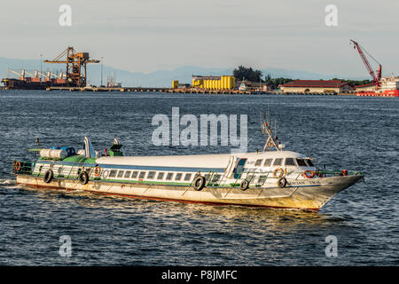 Fast ferries in Labuan harbour they bring people to and from the duty ...
