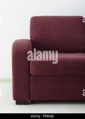 Sofa in white room. Close-up Stock Photo - Alamy