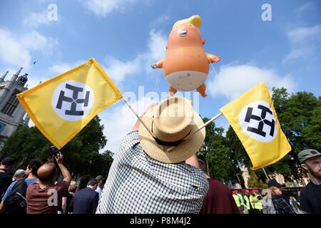 A six-metre balloon depicting as US President Donald Trump a nappy-clad ...