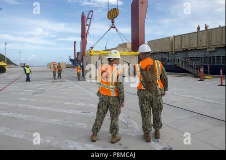 Sailors assigned to Navy Cargo Handling Battalion (NCHB) 11, conduct ...
