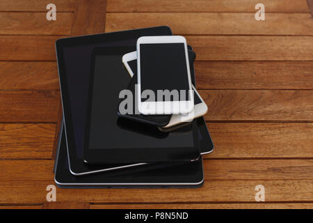 Stack of smart phones and digital tablets Stock Photo - Alamy