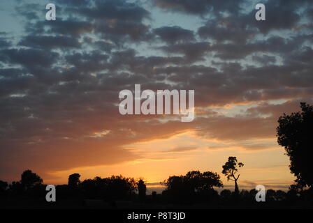 Cloudy sunset over the Suffolk countryside, England Stock Photo - Alamy
