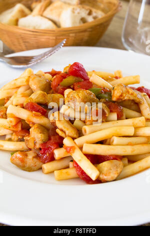 Sautéed pork and Provencal pasta Stock Photo - Alamy