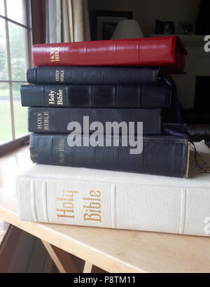 Holy bibles stacked Stock Photo - Alamy