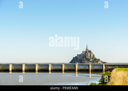 Hydraulic dam on the Couesnon river in front of Mont Saint-Michel tidal ...