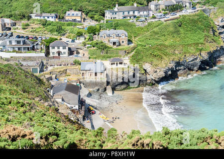 Atlantic ocean surf waves hit the cliffs at Newquay, Cornwall, England ...