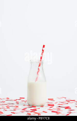 Canadian dairy: milk in a bottle with Canadian flags Stock Photo - Alamy