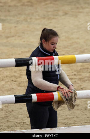 A girl on the obstacle course in adventure park, closeup cropped shot ...