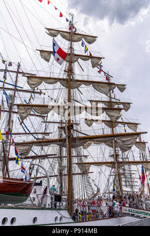 Mast of sailing vessels tall spar, or arrangement of spars at tall ...