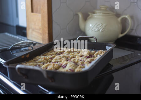 Raspberry and white chocolate crumble tray bake Stock Photo - Alamy