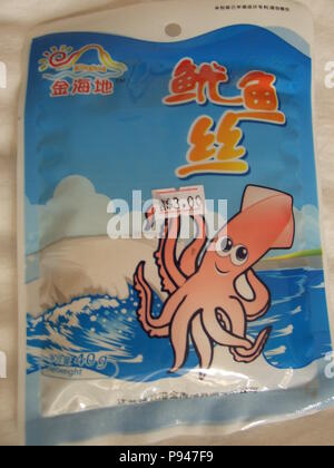 Dried shredded fish snack and squid isolated on white Stock Photo - Alamy