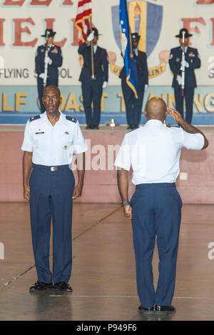 Col. Jason Janaros, 37th Training Wing, commander, speaks with other distinguished guests prior ...