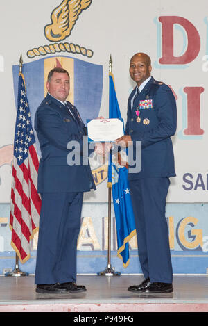 Col. Jason Janaros, 37th Training Wing, commander, speaks with Tim Woliver, Lt Col USAF Ret ...