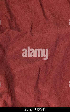 Wrinkled, crumpled red fabric texture background. Wrinkled and creased ...