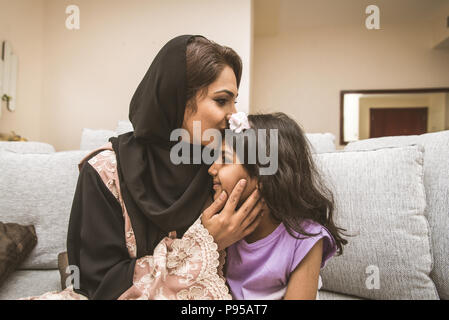Happy arabian family having fun at home Stock Photo - Alamy