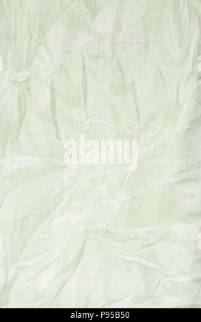 Wrinkled, crumpled yellow fabric texture background. Wrinkled and ...