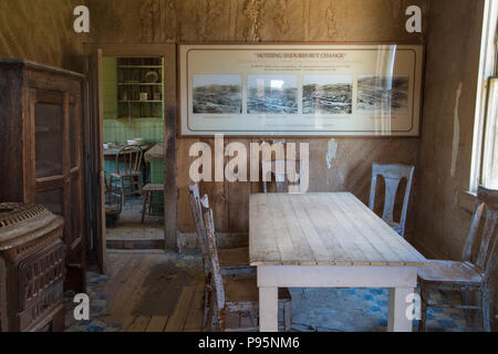 Interior of home in Bodie State Historic Park with portrait of George ...