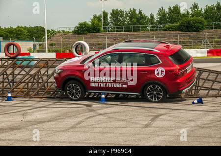 test drive of SUV car with obstacles on field Stock Photo - Alamy