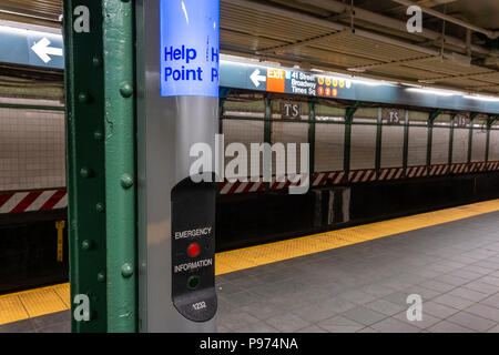 Emergency button in a public city park with an English word emergency ...