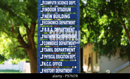College direction sign board with sunlight Stock Photo - Alamy