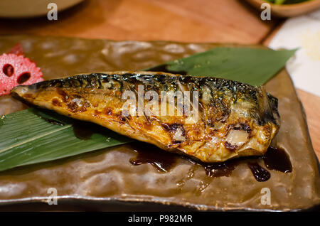 Japanese style grilled Saba Mackerel fish with teriyaki sauce. Vertical ...