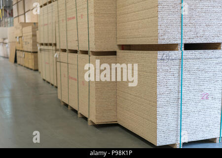 Warehouse of fiberboard and chipboard. Construction Materials. Wooden ...