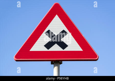 Dutch road sign: dangerous crossing Stock Photo - Alamy