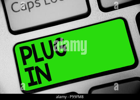 Handwriting text Plug In. Concept meaning putting device into ...