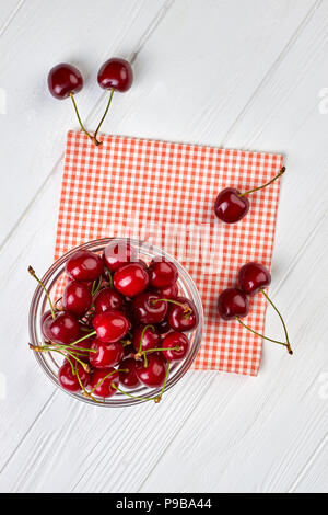 Fresh cherries on checkered tablecloth, concept of healthy food and ...