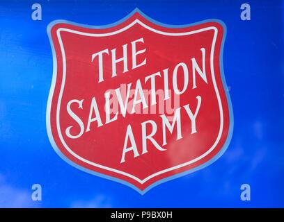 The Red Shield logo of the Salvation Army on the brick wall of a church ...