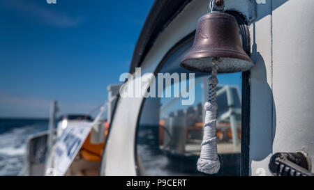 Brass bell on a sailing yacht Stock Photo - Alamy