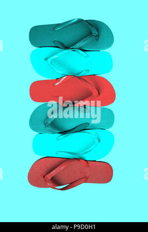 several multi colored rubber flip flops on a white background Stock ...