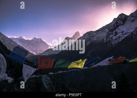 Nepal, Namche Bazar, colourful sun-bleached tourist souvenir Buddhist ...
