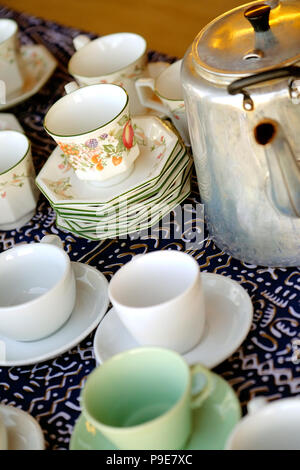 Stack of tea cups and saucers Stock Photo - Alamy